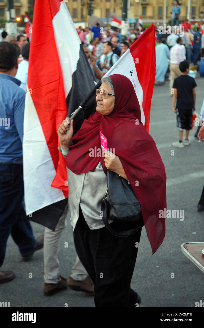 A female senior citizen attends a demonstration against Egyptian ...