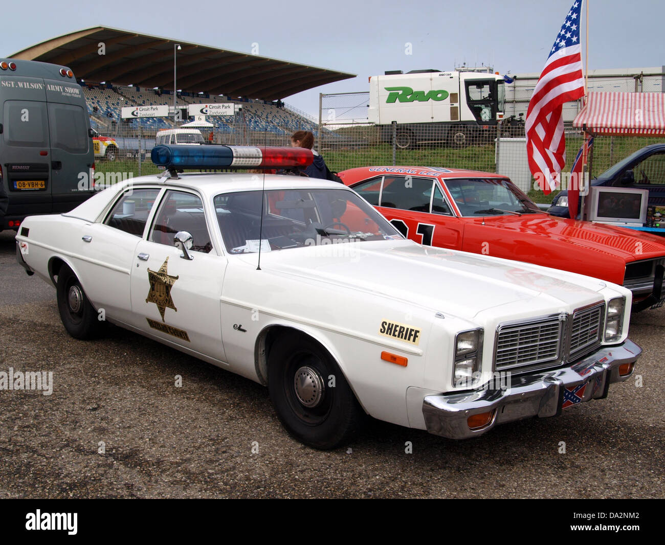 This image features a classic Dodge Monaco police car at the Nationaal ...