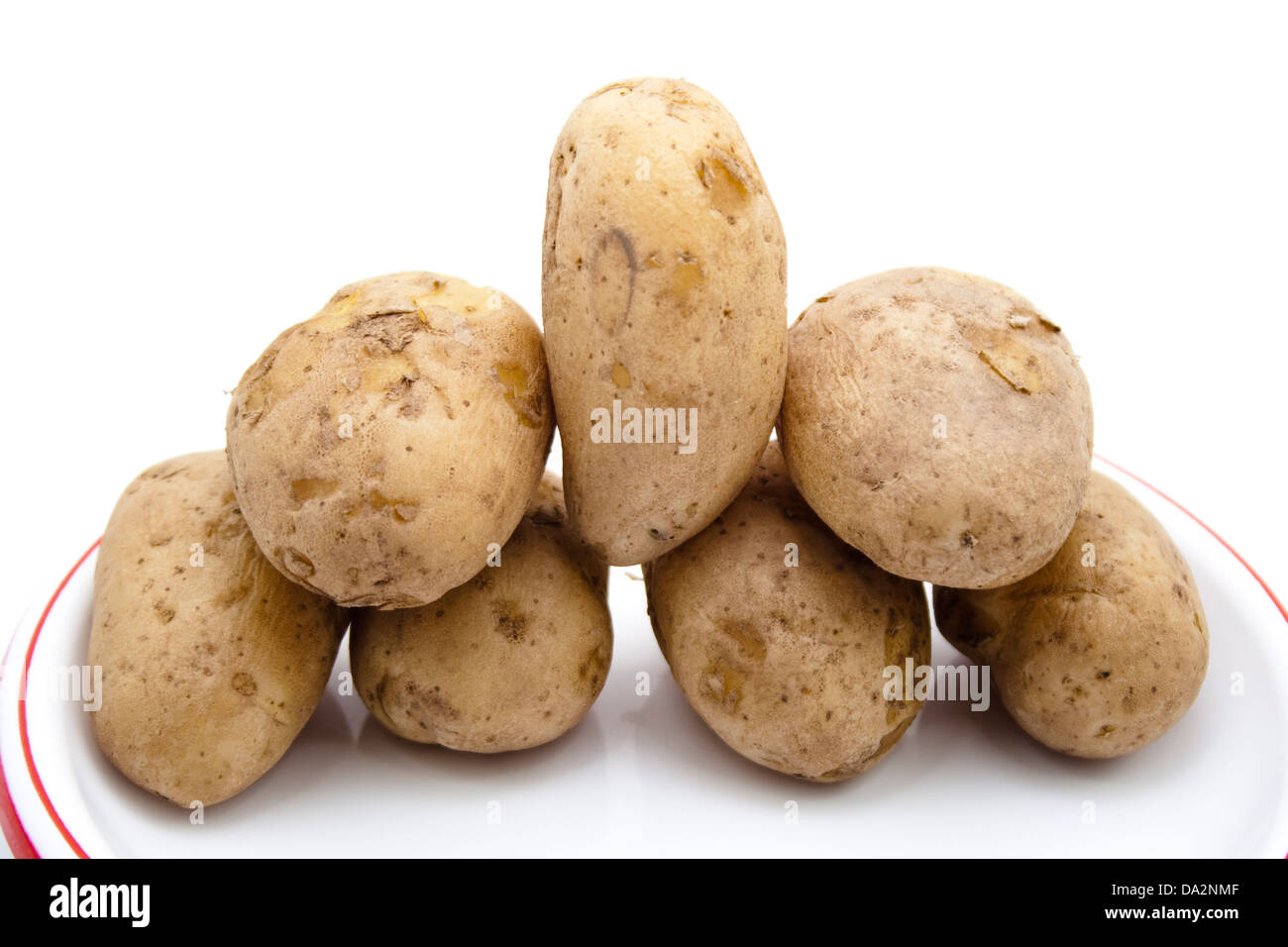 Fresh Brown Cooked Potatoes on Plastic Plate Stock Photo - Alamy