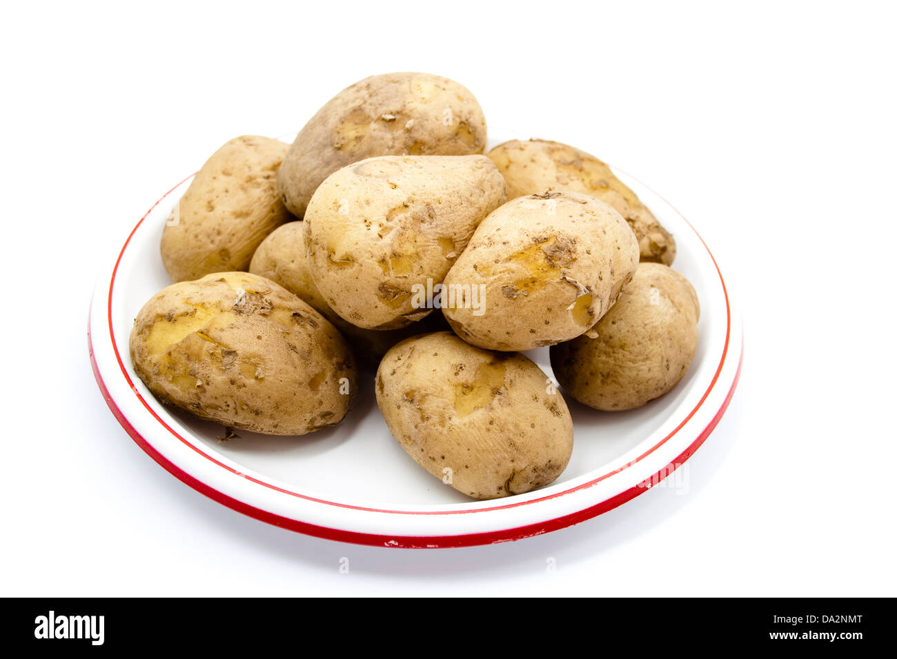 Fresh Brown Cooked Potatoes on Plastic Plate Stock Photo - Alamy