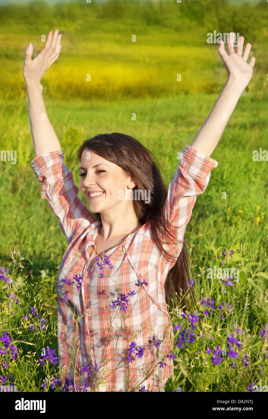 Happy smiling girl in nature Stock Photo - Alamy
