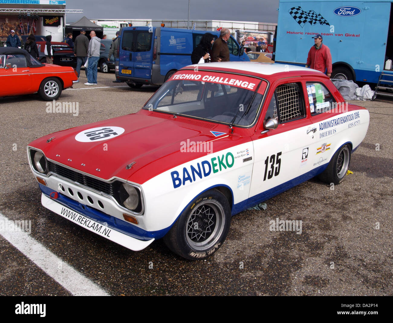 This image showcases the Red, White, and Blue Ford racecar ...