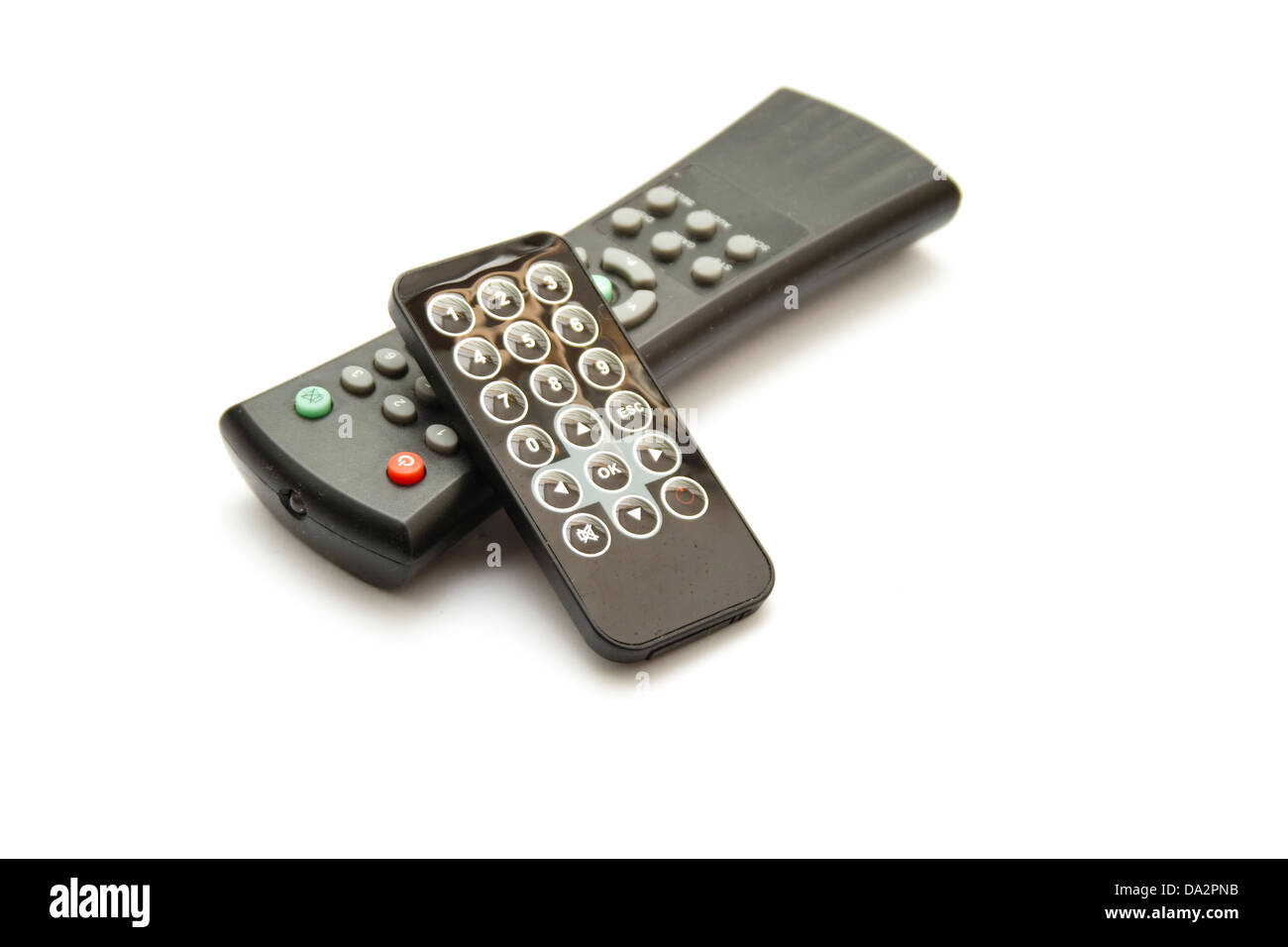 Different Remote Control on white background Stock Photo - Alamy