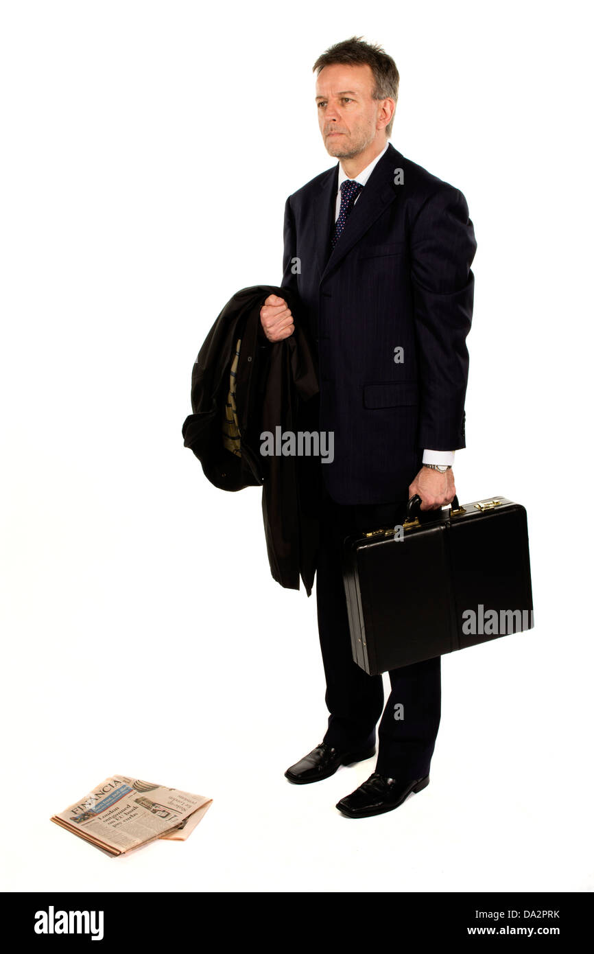Serious Businessman With Suitcase