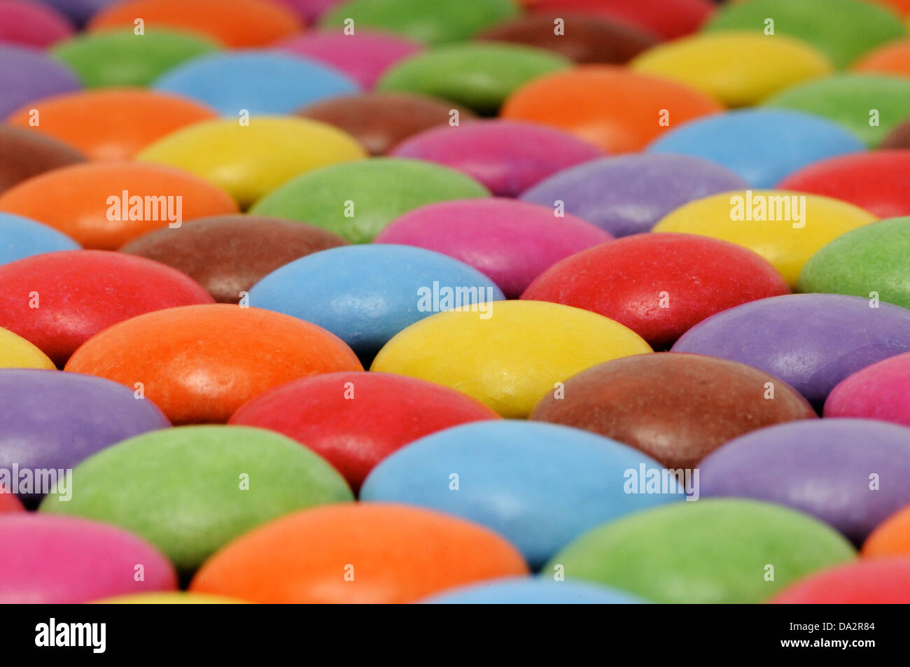 Close up of some Smarties chocolate coloured sweets Stock Photo - Alamy
