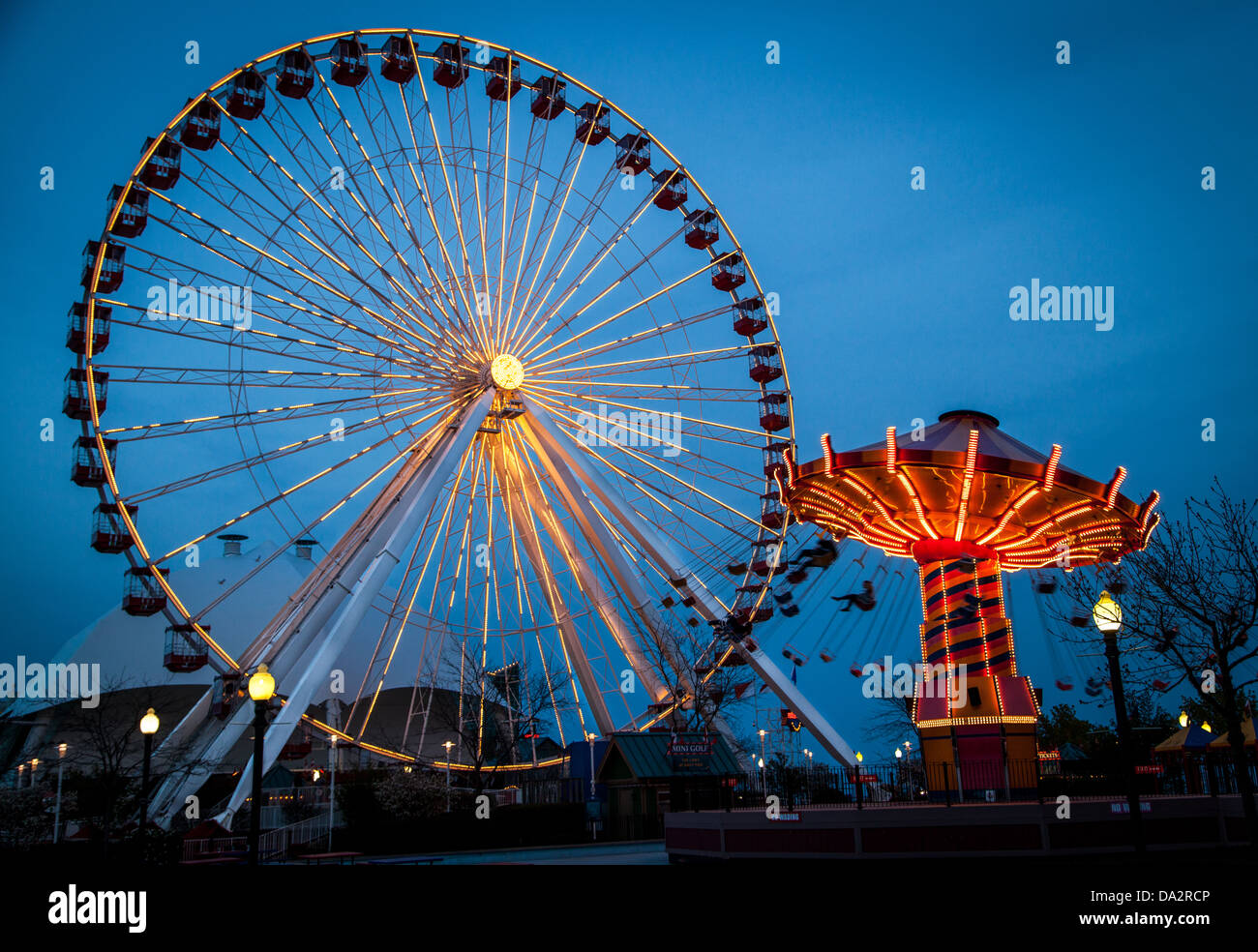 Ferris wheel and Wave Swinger at Navy Pier in Chicago Stock Photo - Alamy