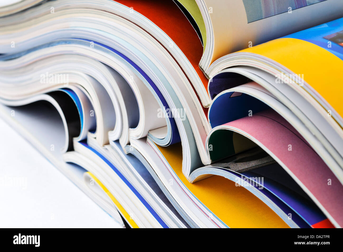 Pile of colorful magazines Stock Photo - Alamy
