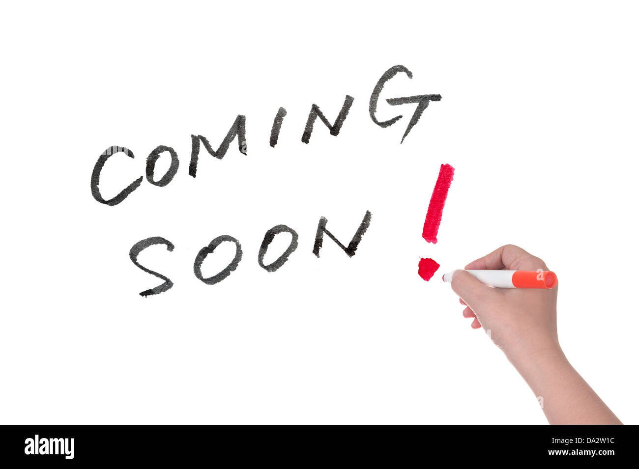 Coming soon words written on white board Stock Photo - Alamy