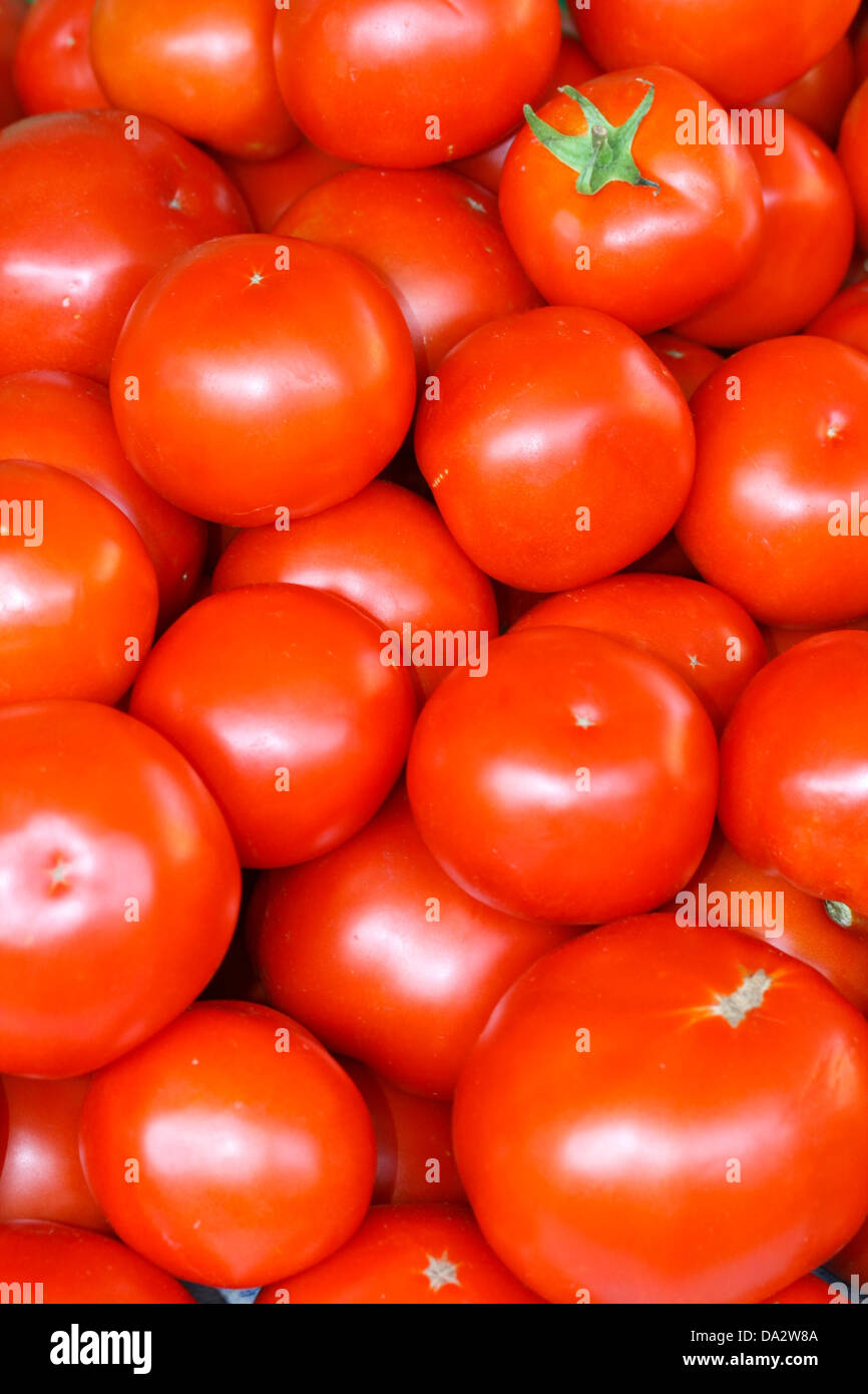 This is a close up shot of bundle of tomatoes like nice food background ...
