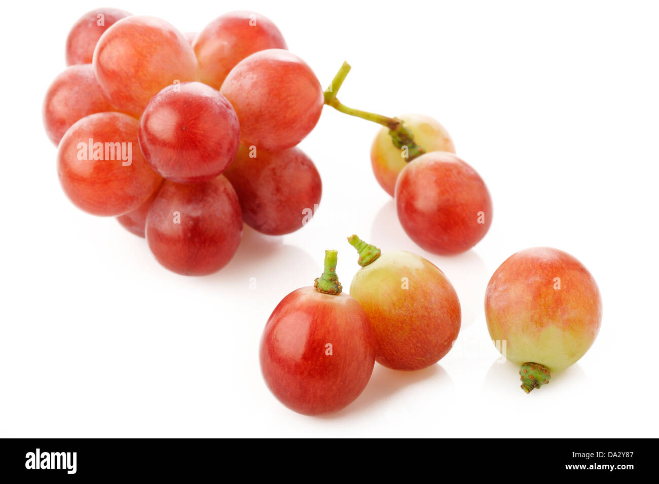 Fresh red grapes isolated on white background Stock Photo - Alamy