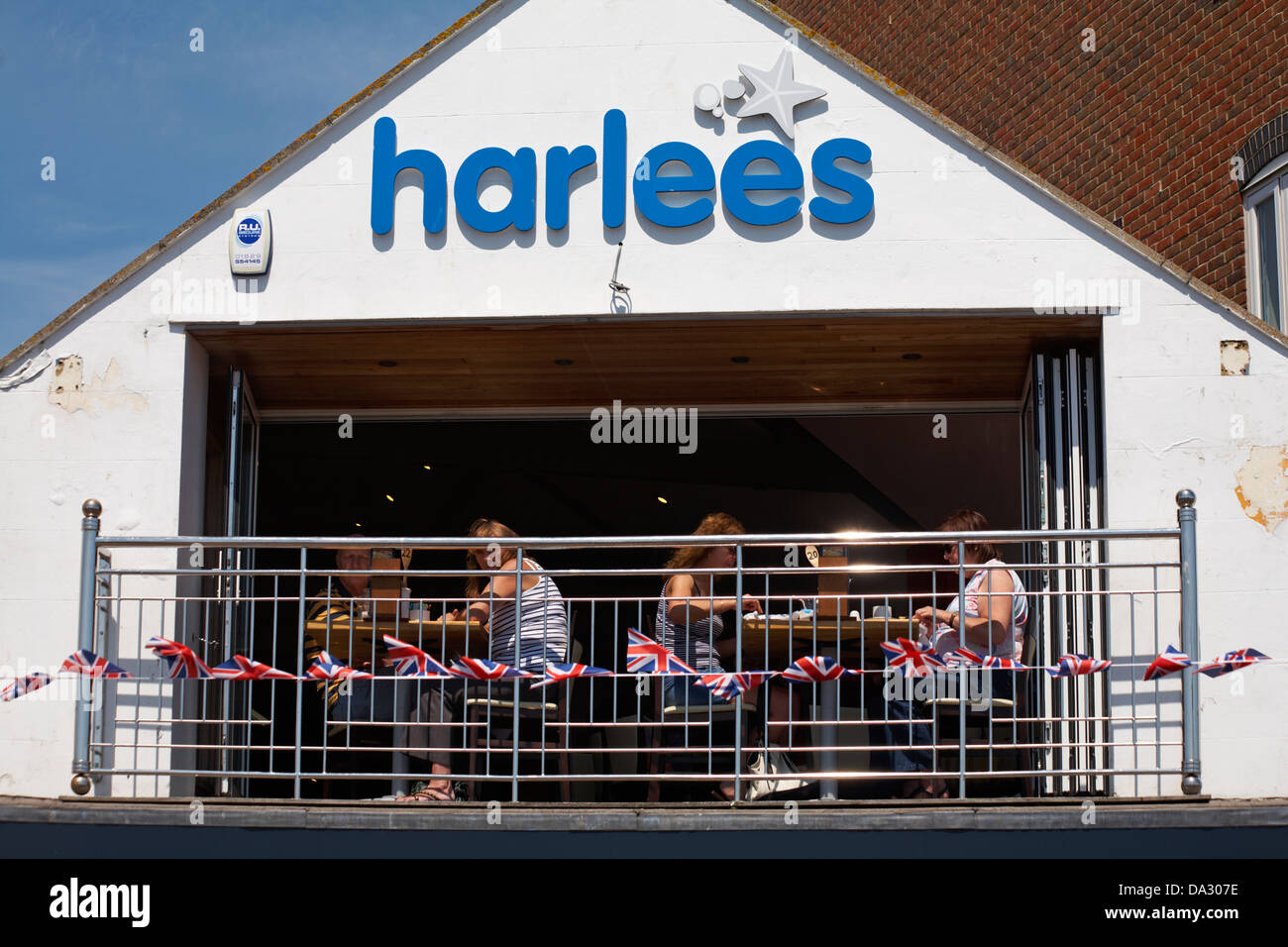 Dining at harlees, fish & chips restaurant at Poole Quay in June Stock ...
