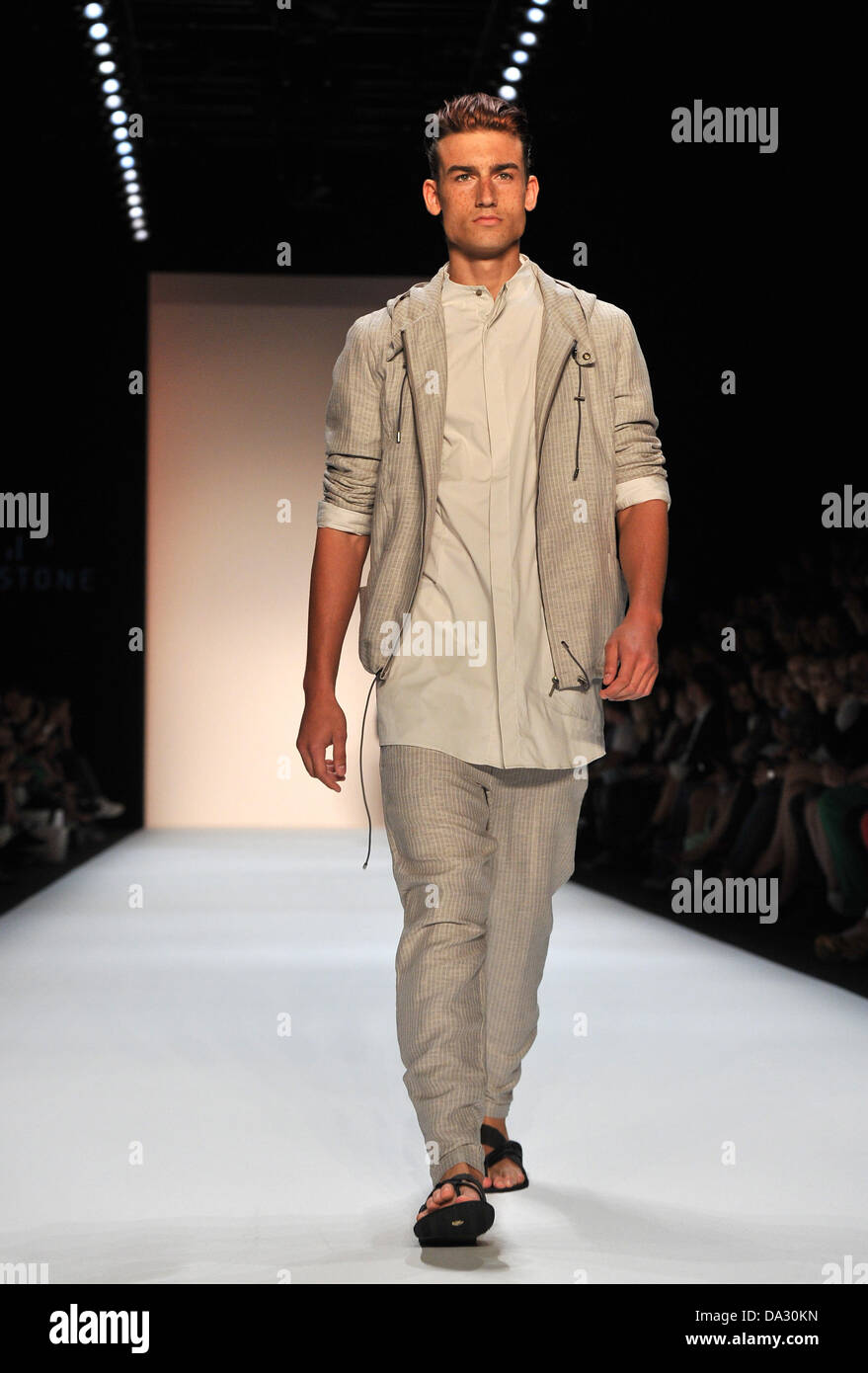 Berlin, Germany. 2nd July 2013. A male model presents a creation at the ...