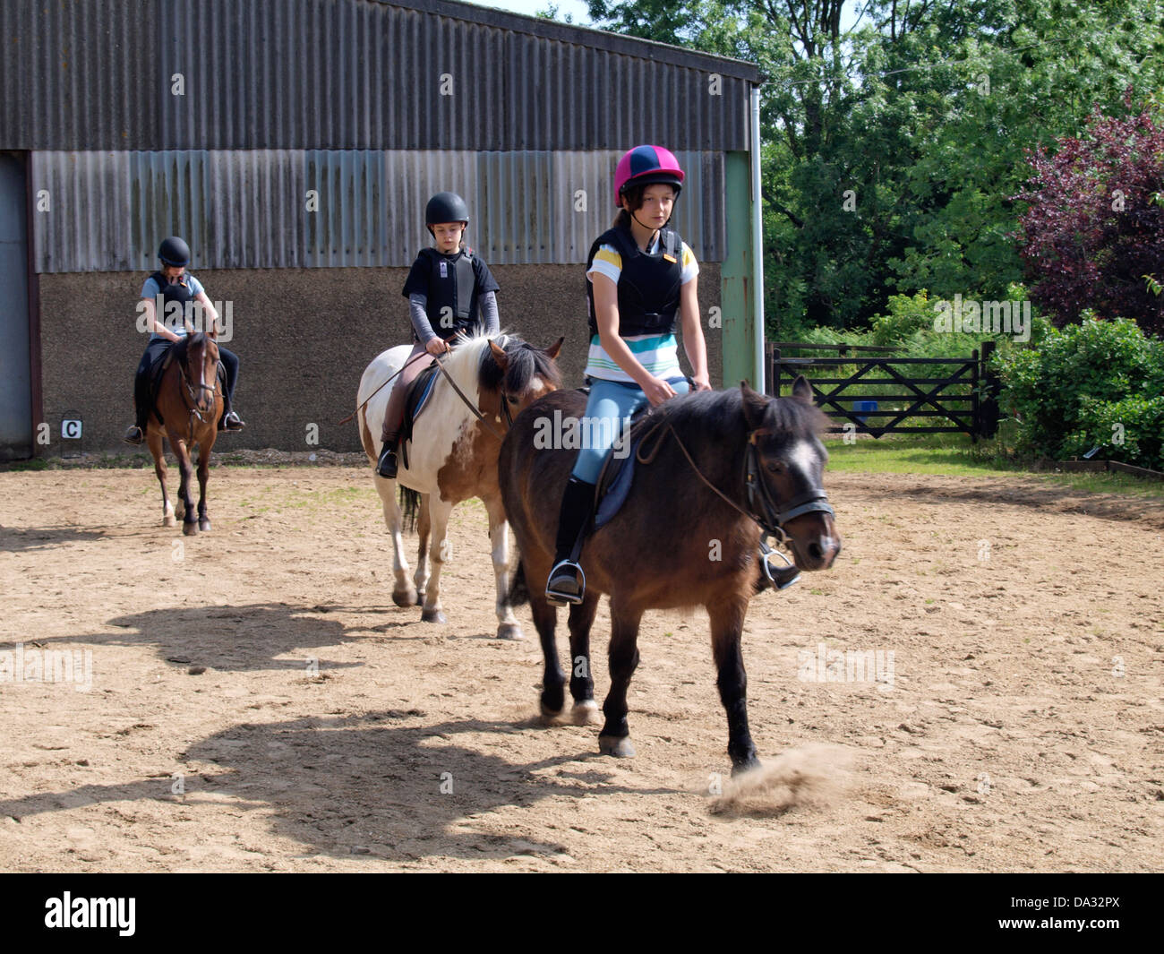 Kids riding ponies hi-res stock photography and images - Alamy
