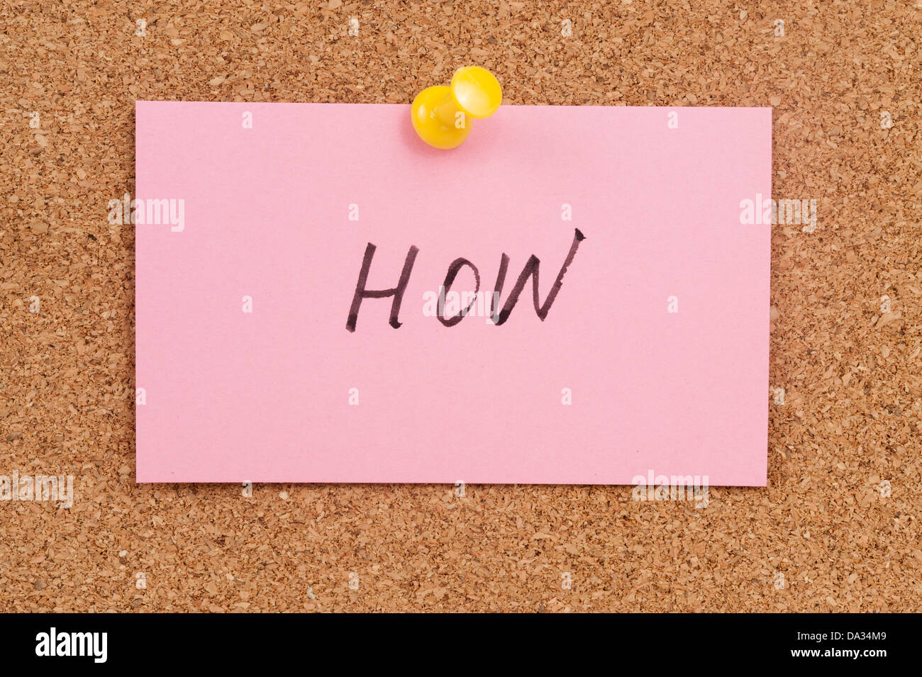 How word written on paper and pinned on cork board Stock Photo - Alamy