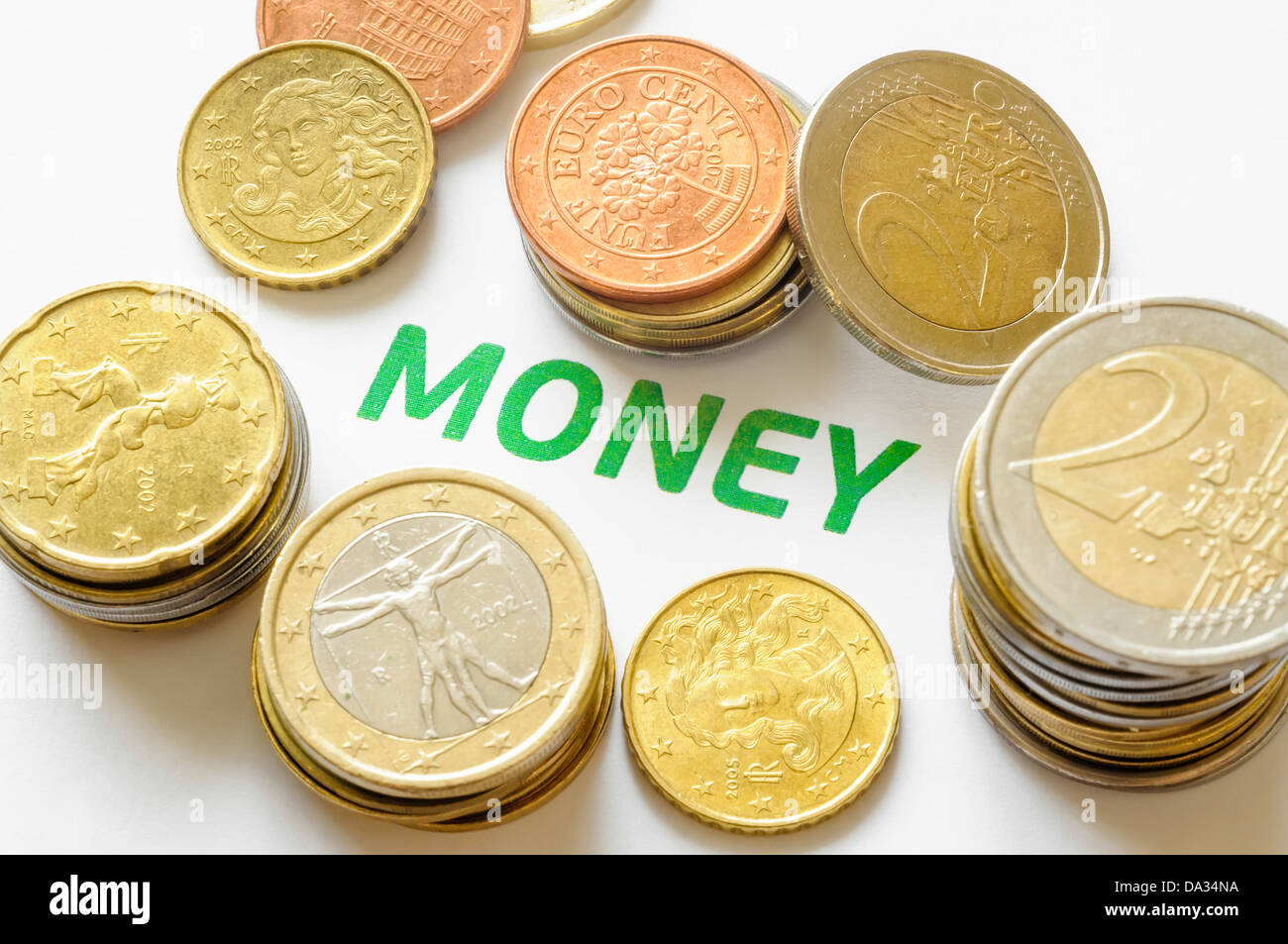 Many Euro coins and green "Money Stock Photo - Alamy