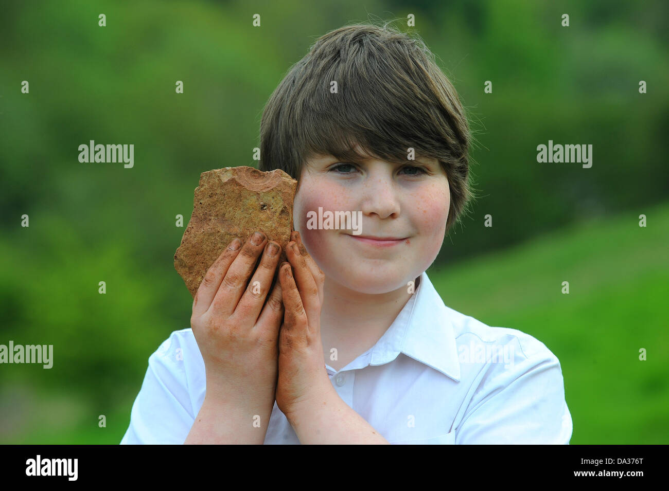 A snail fossil that had an anti-clockwise spiral on its shell, showing ...