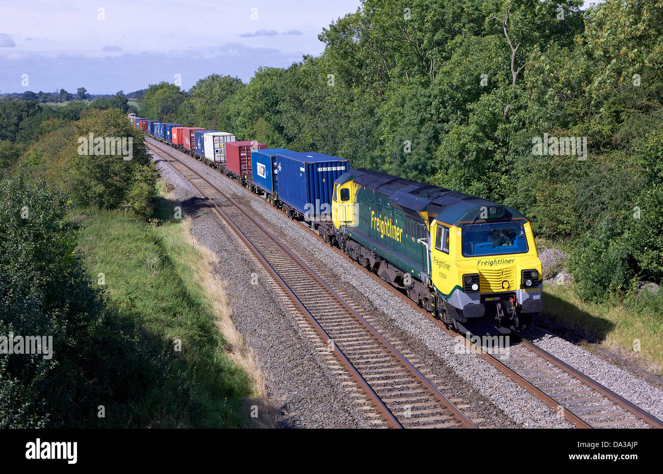 70009 heads through Shrewley, Warwickshire with a diverted 4O27 Ditton ...