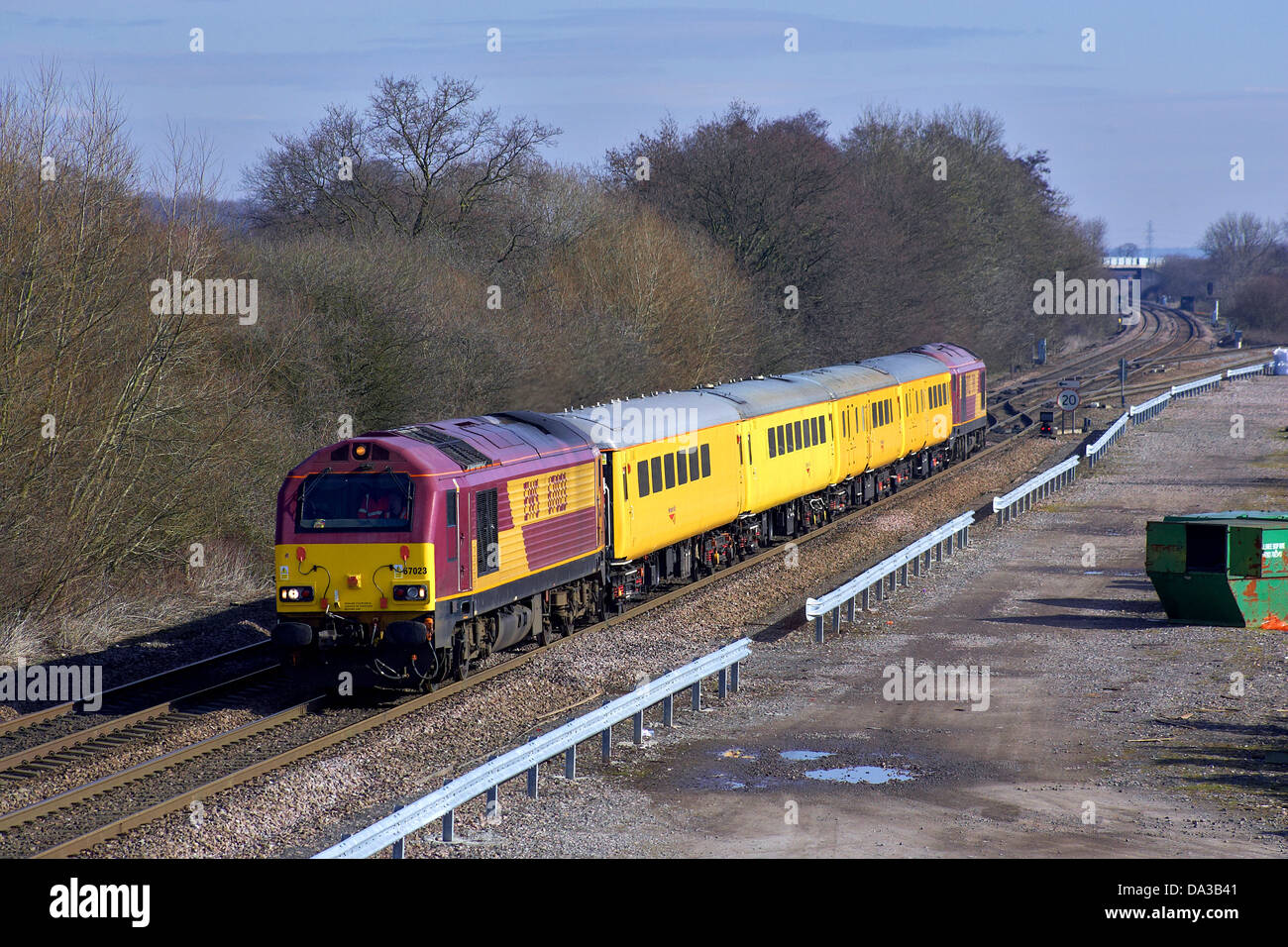 67023 passes through Stenson Junction in top and tail formation with ...