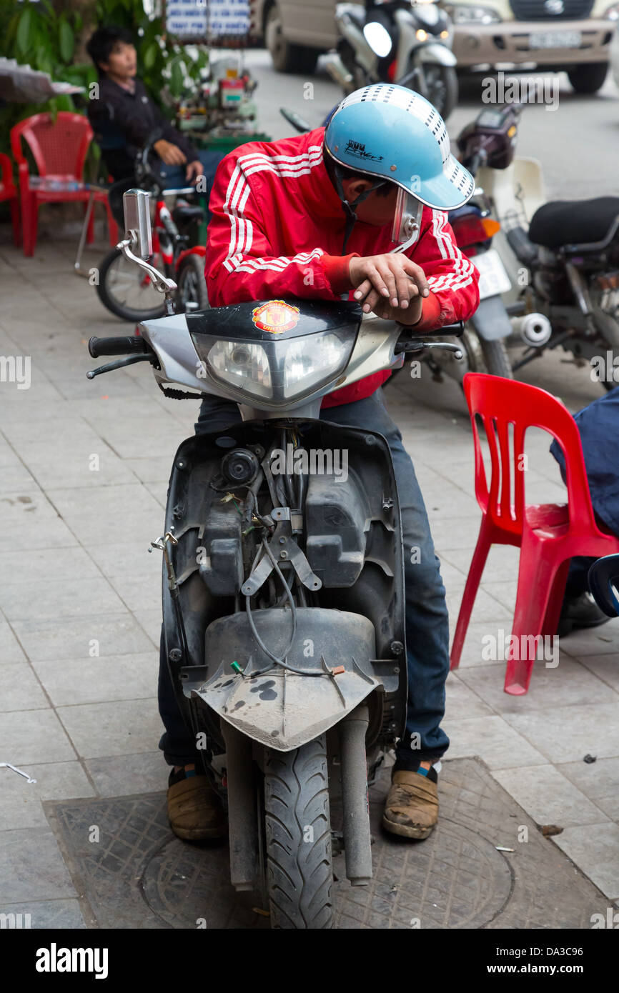 Scooter Drivers in Hanoi, Vietnam Stock Photo - Alamy