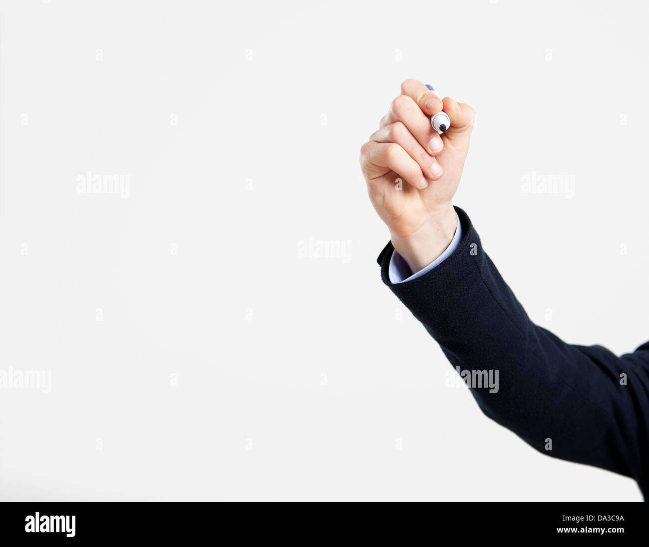 Male hand writing something on a glass writeboard Stock Photo - Alamy