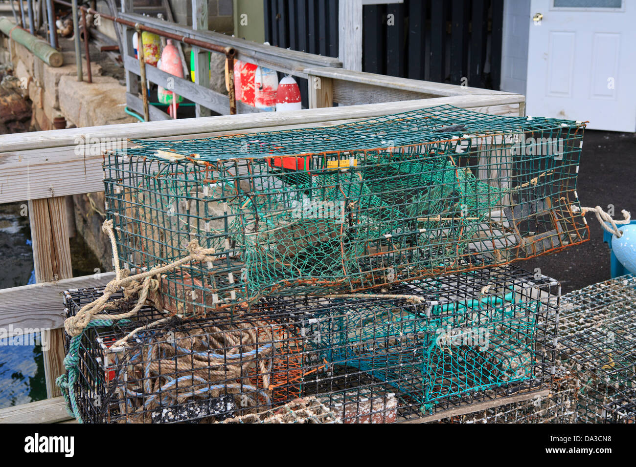Lobster pots and buoys on a fishing dock, Maine Stock Photo - Alamy