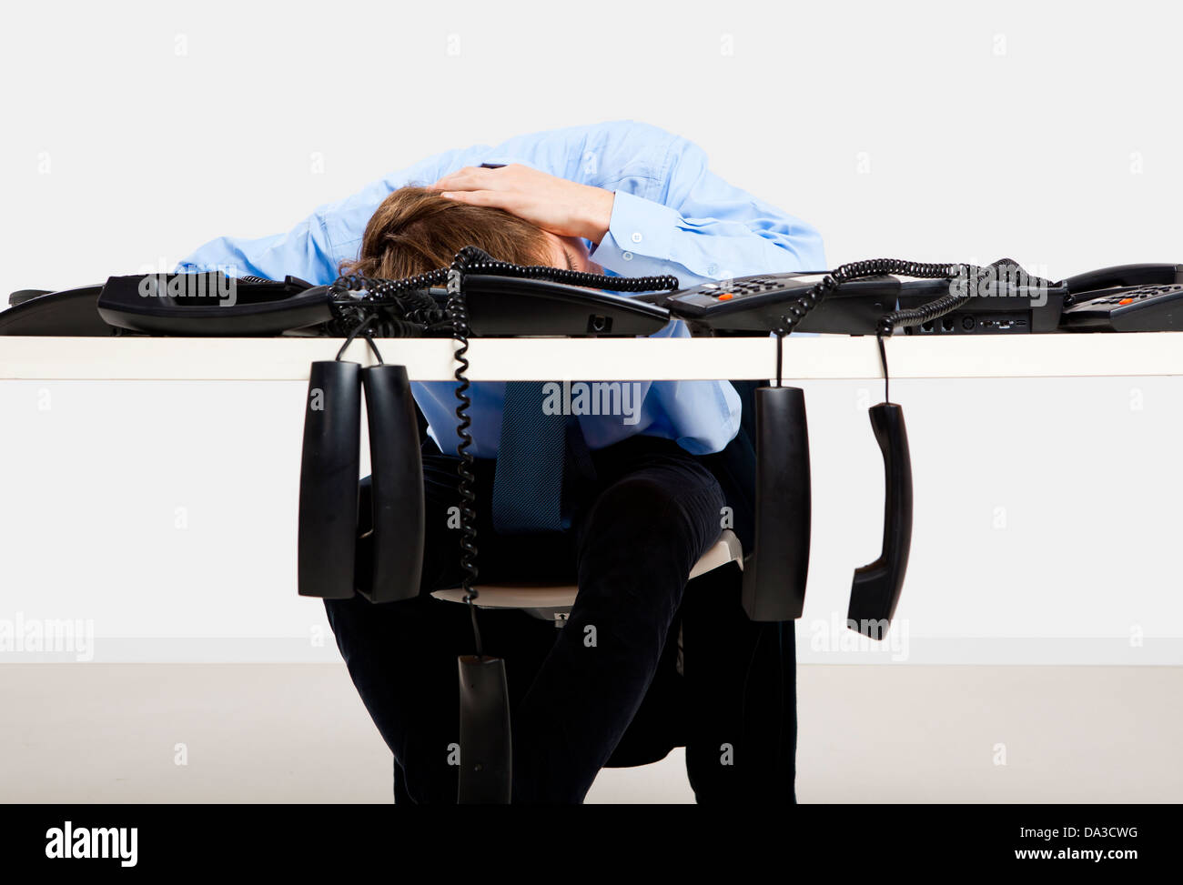 Tired receptionist hi-res stock photography and images - Alamy