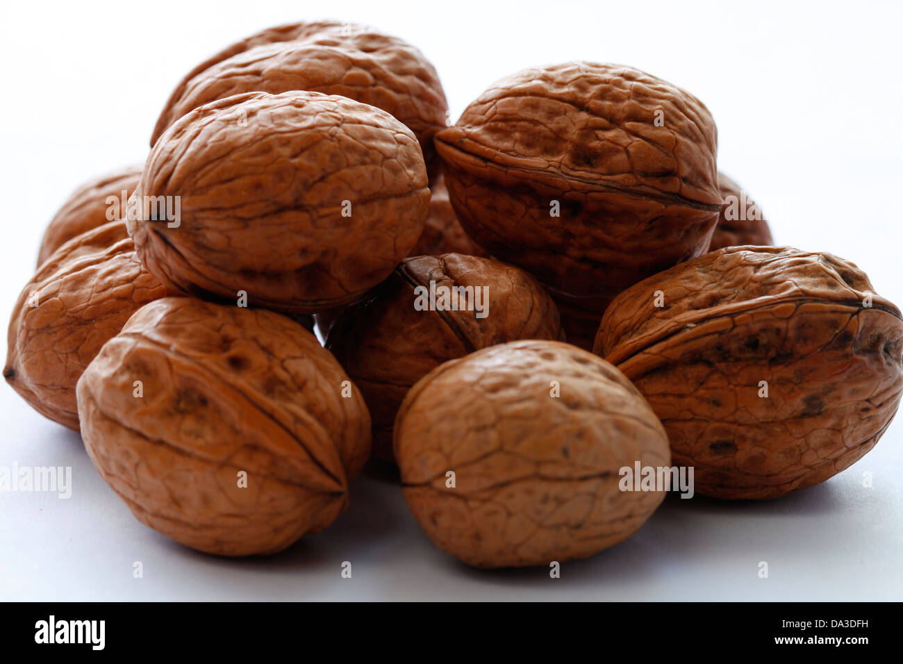 Walnut Stack On White Background Stock Photo - Alamy