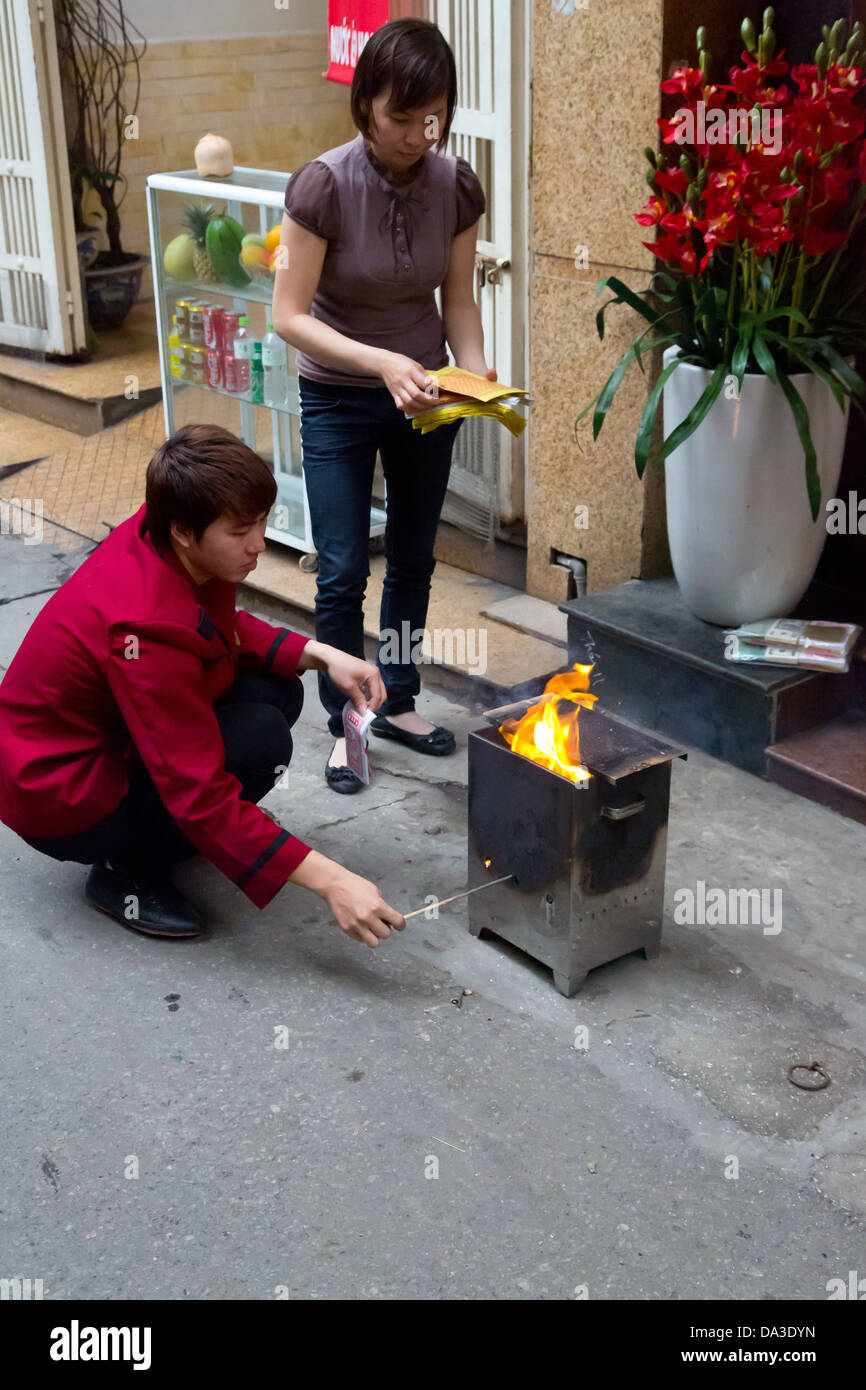 Fire on the Pavement in the Old Quarter in Hanoi, Vietnam Stock Photo ...