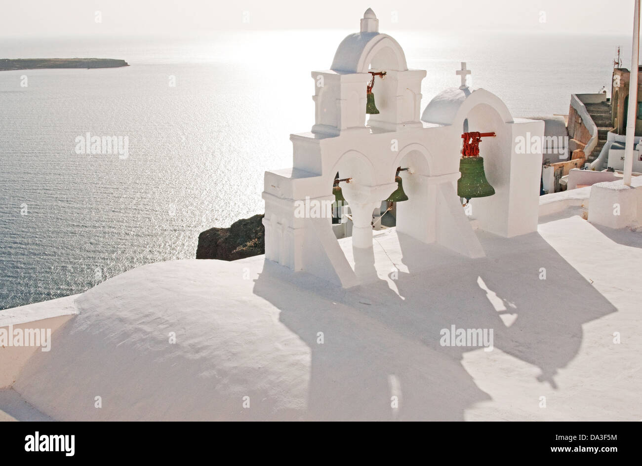 Church bells with Aegean Sea in background, Oia, Santorini, Greece ...