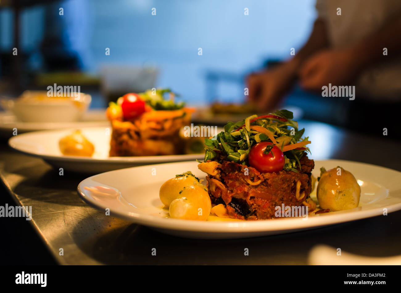 Food being prepared at a fine dining college restaurant Stock Photo - Alamy