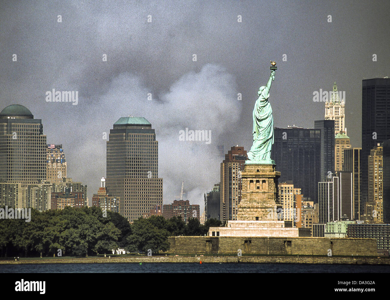 Sept. 12, 2001 - New York, New York, US - Smoke still billows into the ...