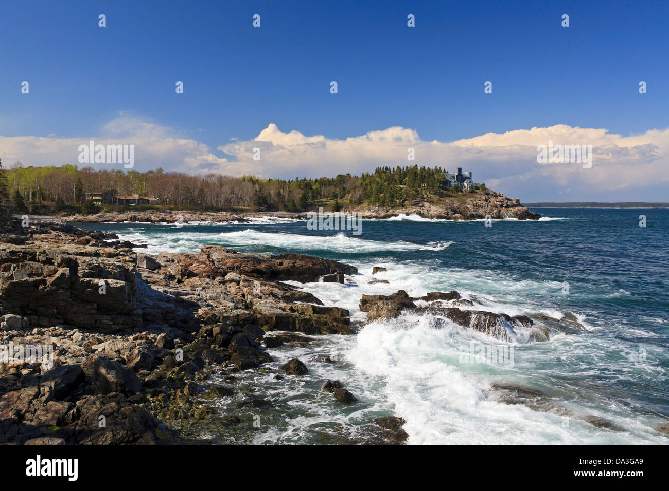 Atlantic Ocean coastline in Acadia National Park, with mansion in the ...