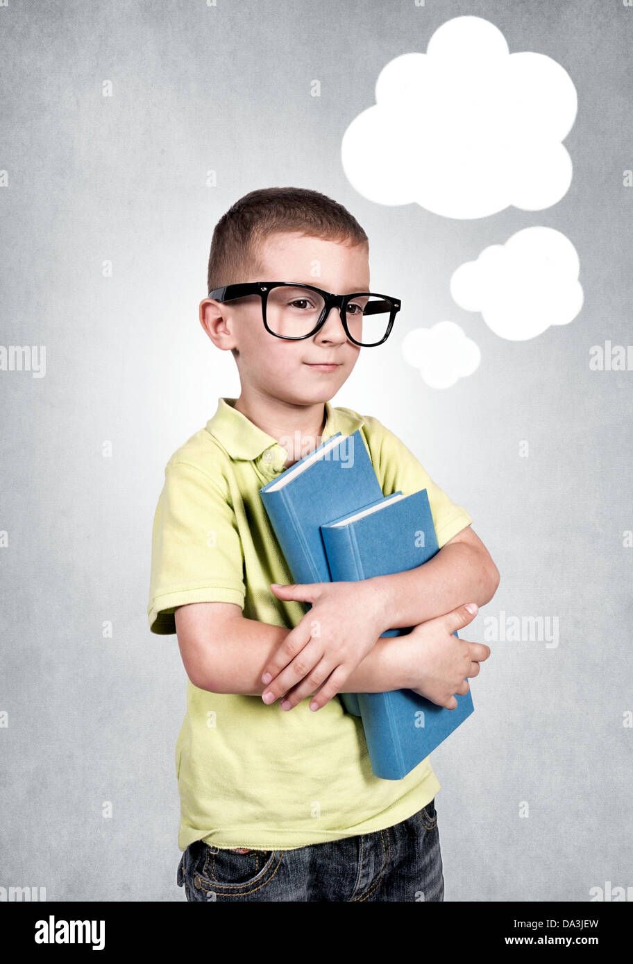 Imaginary little boy with books in hand Stock Photo - Alamy