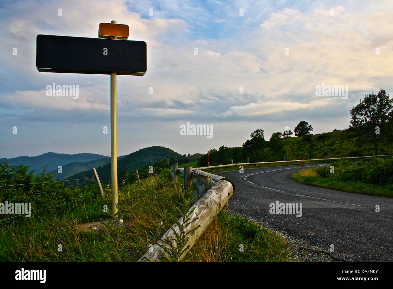 Road Sign in Mountains Stock Photo - Alamy