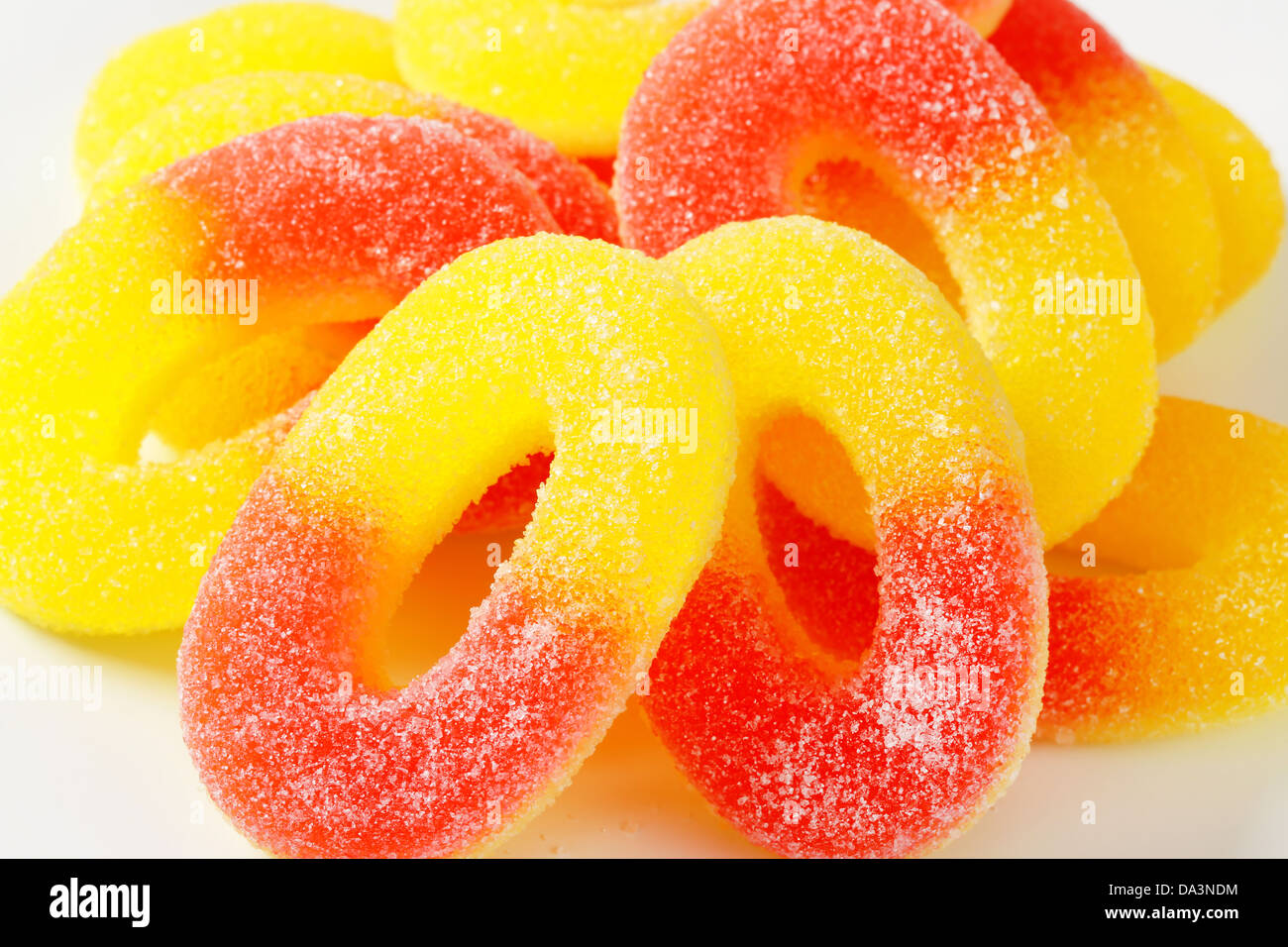 Ring-shaped gummies coated in sugar Stock Photo - Alamy