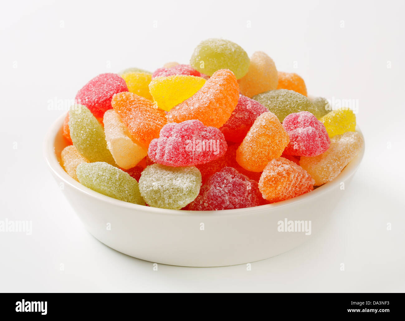 Fruit-shaped gummy candy coated in granulated sugar Stock Photo - Alamy