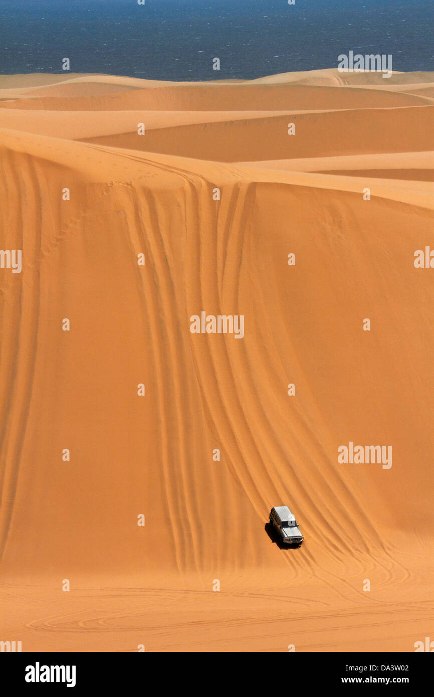 Four wheel drive descending a huge sand dune on a Sandwich Harbour 4x4 ...