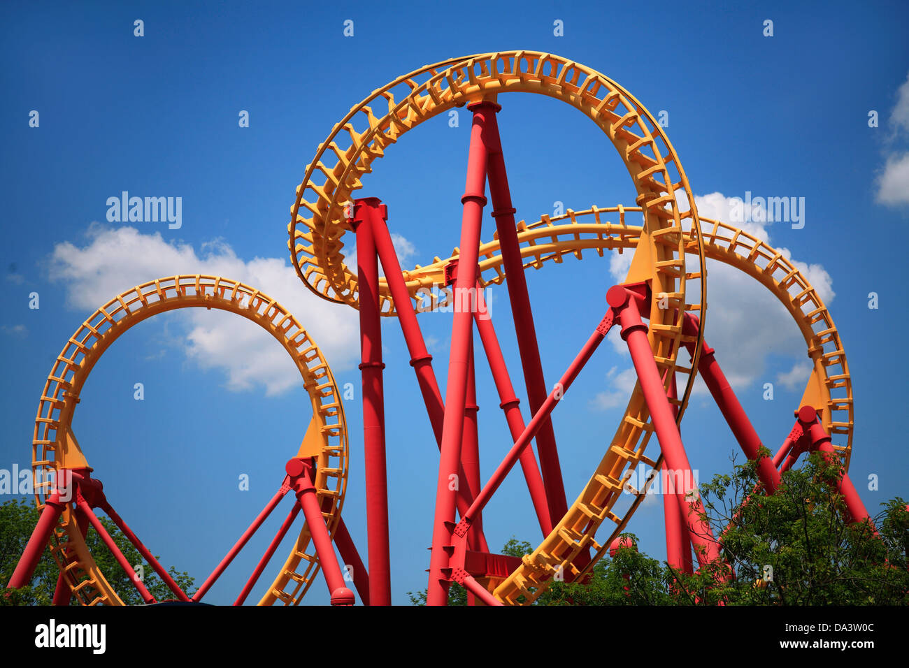 A Colorful Looping Roller Coaster On A Beautiful Sunny Day Stock Photo ...