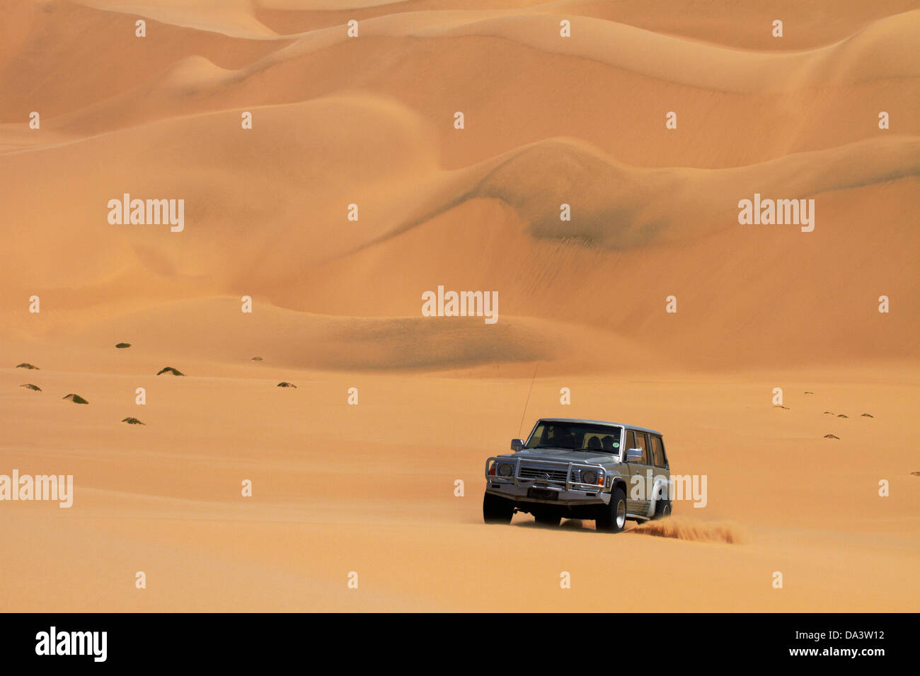 Four wheel drive descending a huge sand dune on a Sandwich Harbour 4x4 ...
