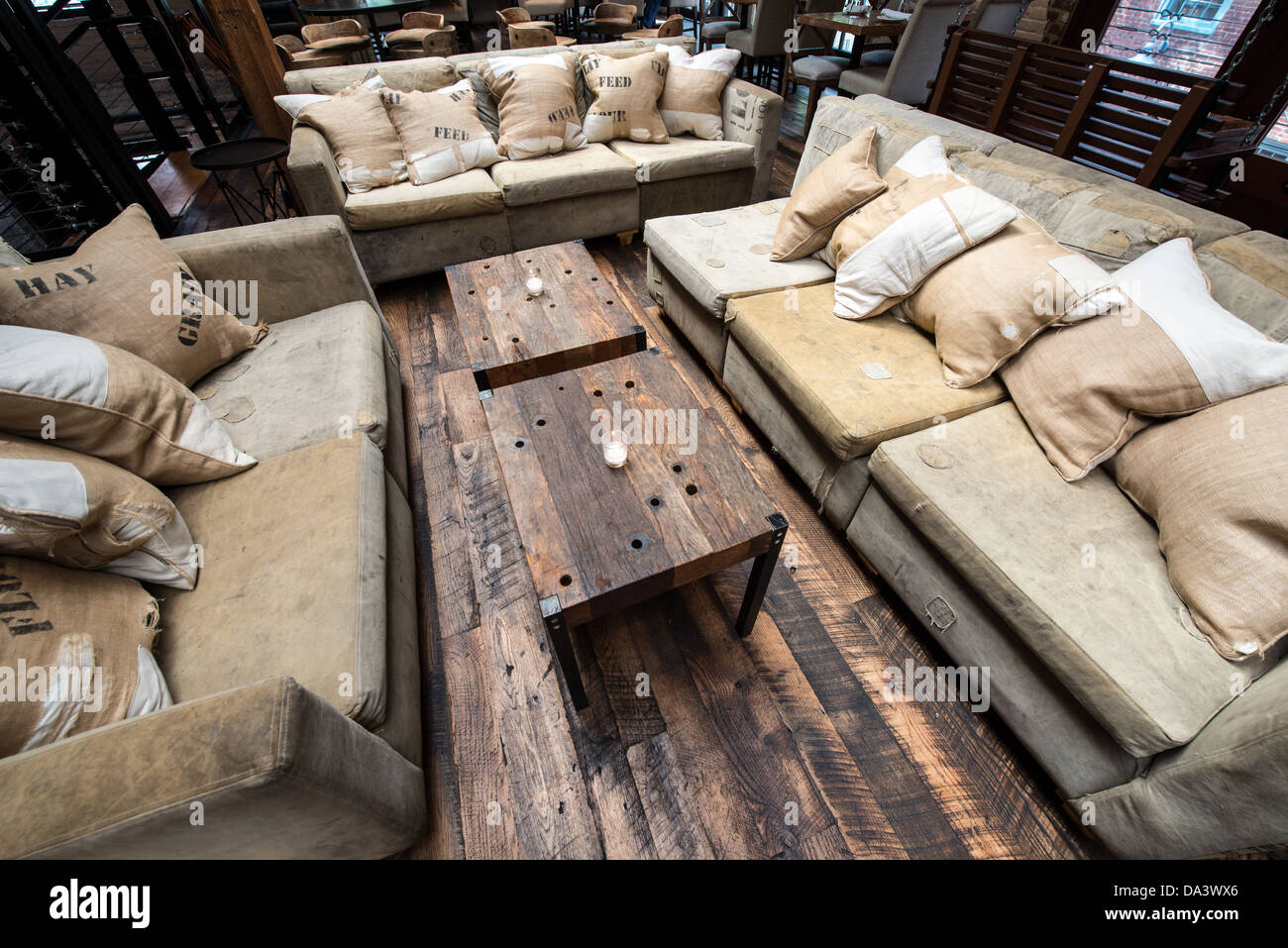 A rustic lounge setting in a restaurant Stock Photo - Alamy