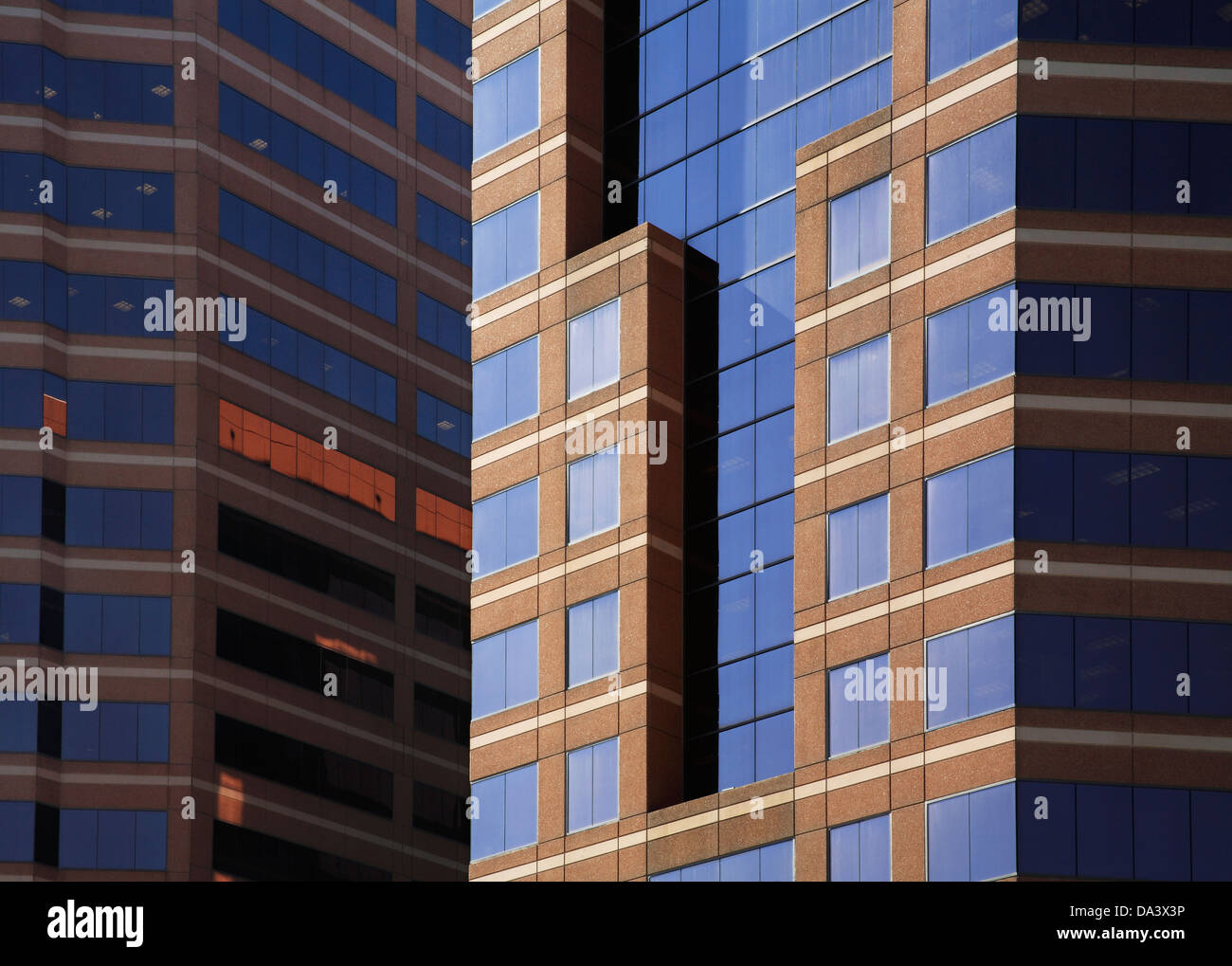 Blue Windows In A Downtown Skyscraper Stock Photo - Alamy