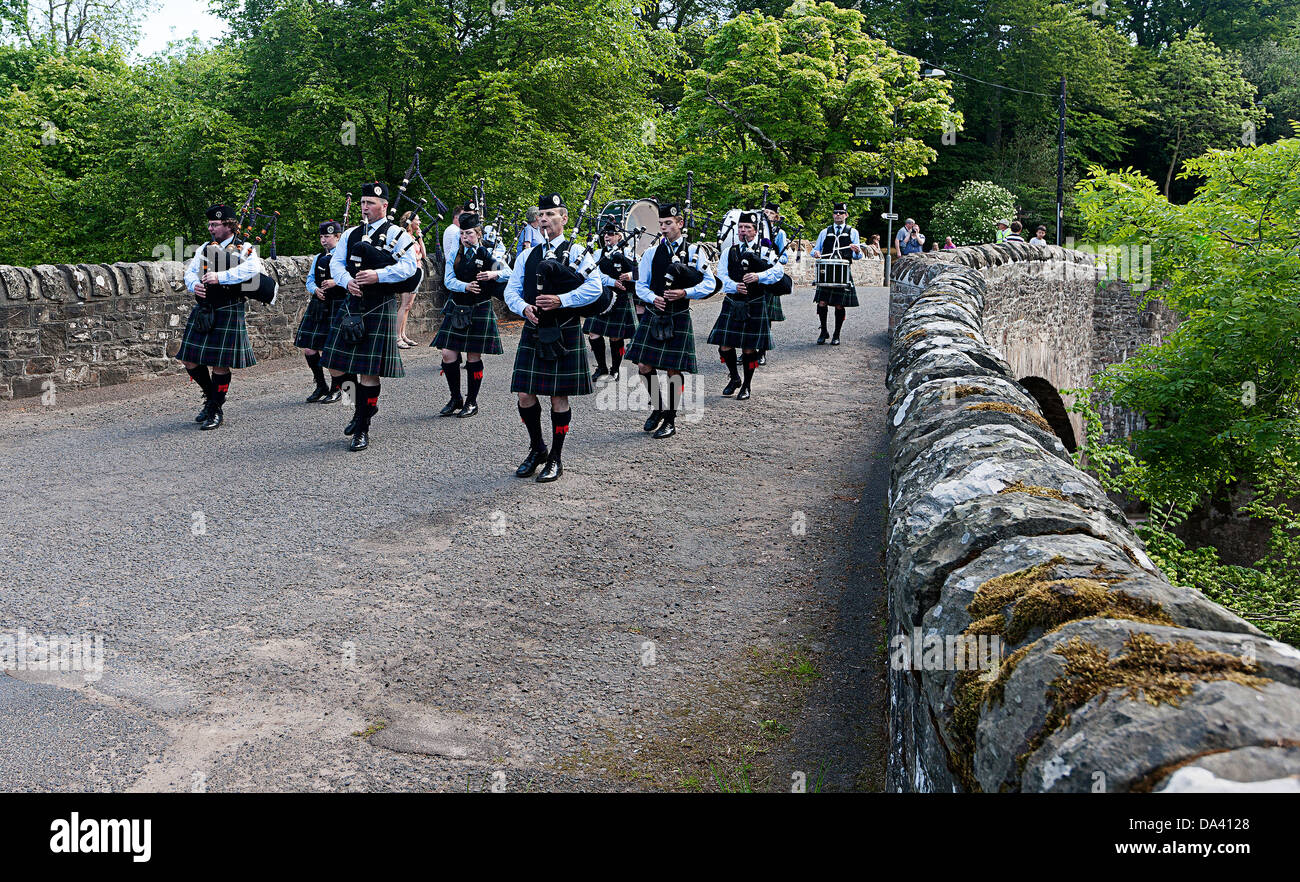 Pipe band playing over the bridge.Longformacus Stock Photo - Alamy