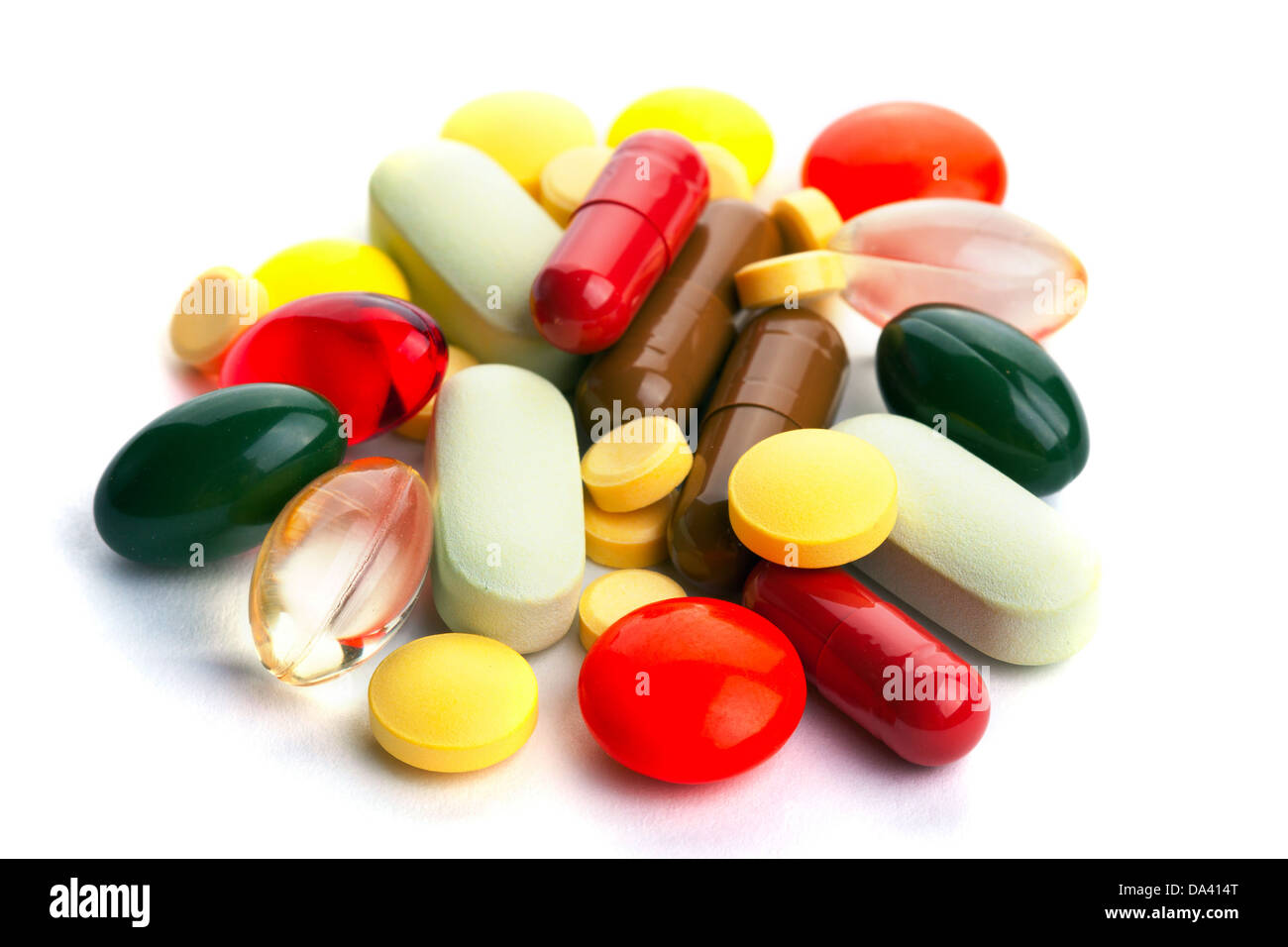 Various colorful pills on white background Stock Photo - Alamy