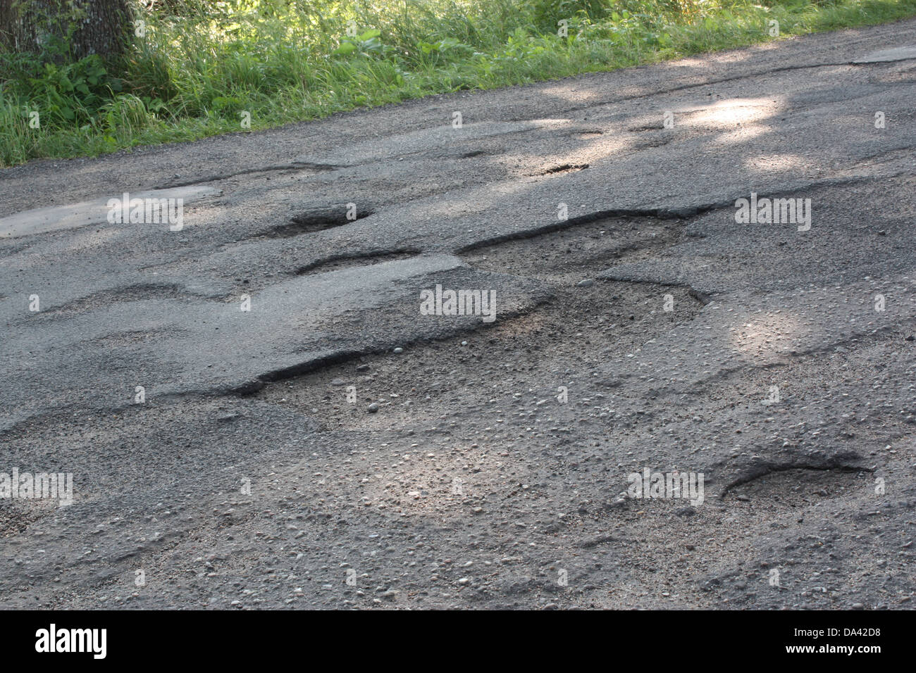 Uneven poor quality road surface hi-res stock photography and images ...