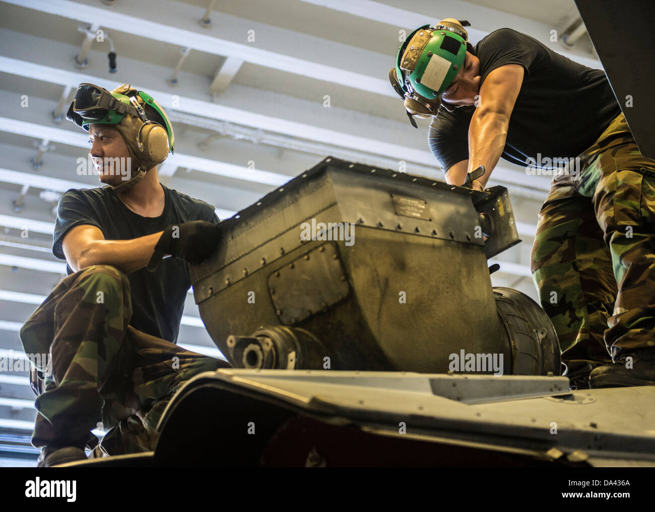Aviation Machinist's Mate (Aircrew) 3rd Class Alex Cuna, left, and ...