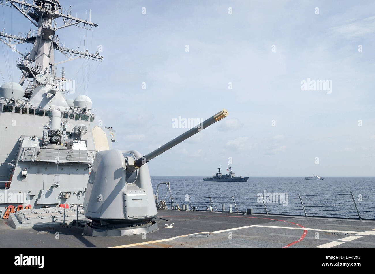 PHILIPPINE SEA (June 29, 2013) From left, the guided-missile destroyer ...