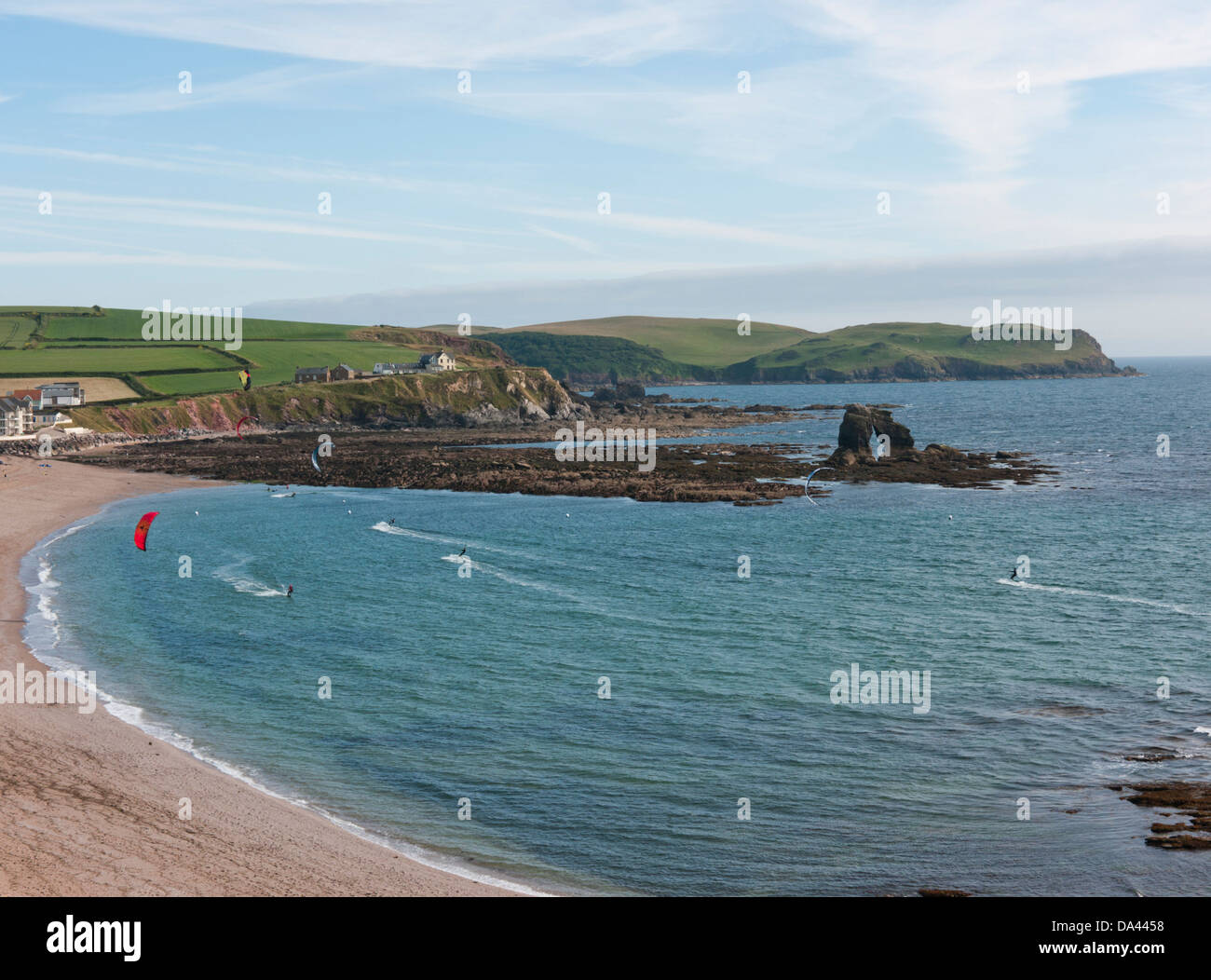 Kite surfers at South Milton Sands and Thurlestone rock in South Devon ...