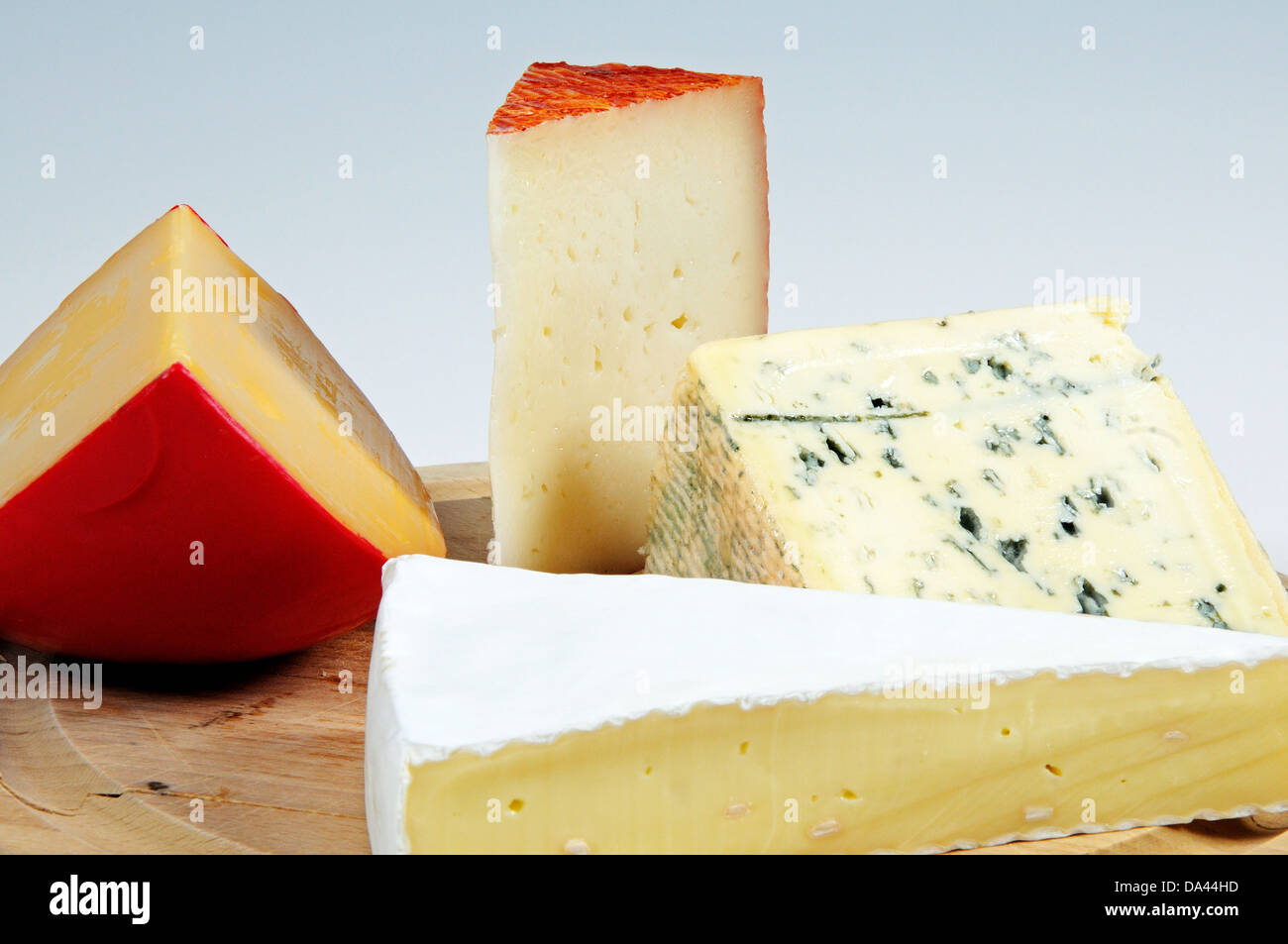 Cheese selection of Dutch Edam, French Brie, Spanish Manchego and ...