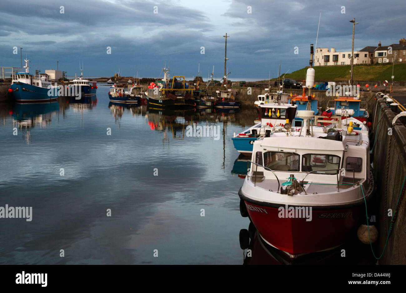 seahouses harbour evening light boats norhumberland Stock Photo - Alamy