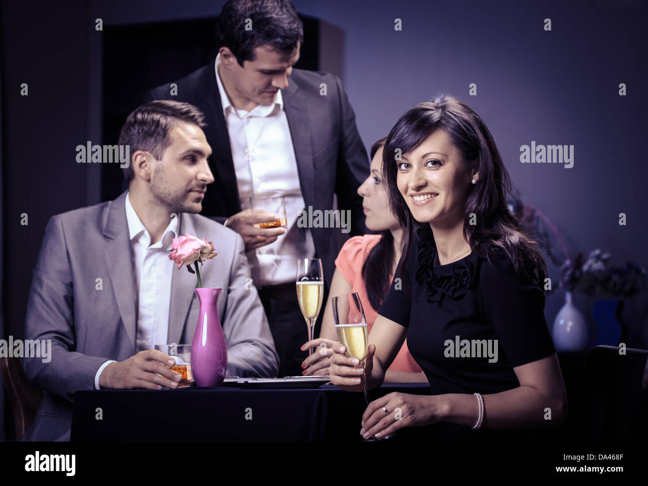 Two friends eating table hi-res stock photography and images - Alamy
